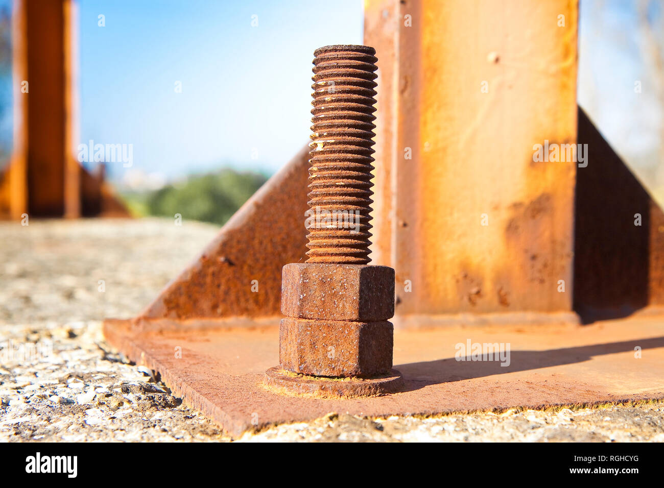 Old rusty anchor bolt with iron plate Stock Photo - Alamy