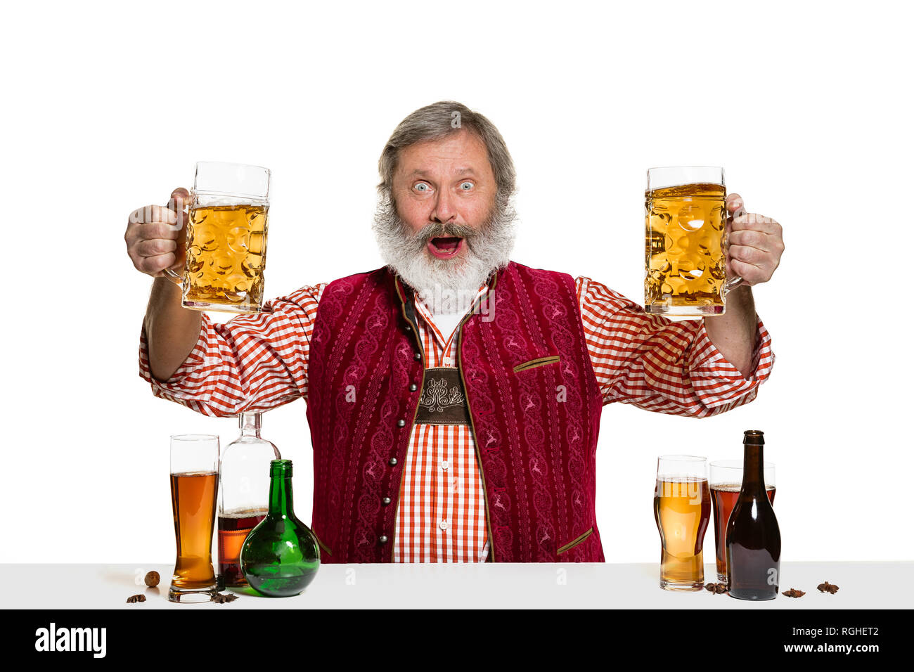 The senior expert male barman with beer at studio isolated on white ...