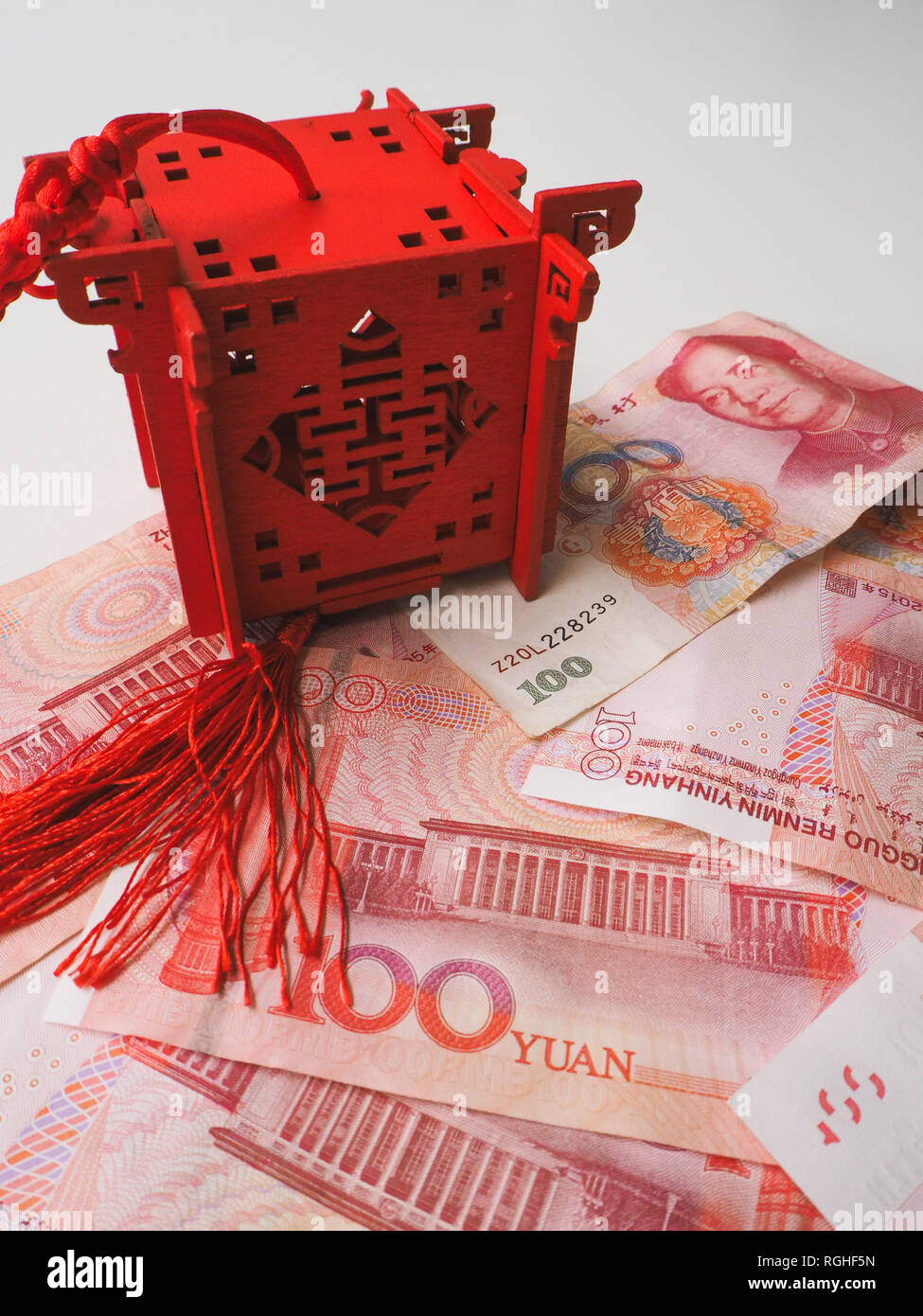 Miniature Chinese pavilion in bright red standing on Chinese 100 ...