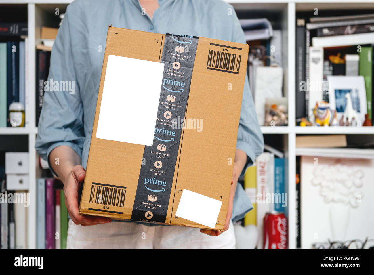 PARIS, FRANCE - JUL 4, 2018: Woman holding presentation of Amazon Prime ...