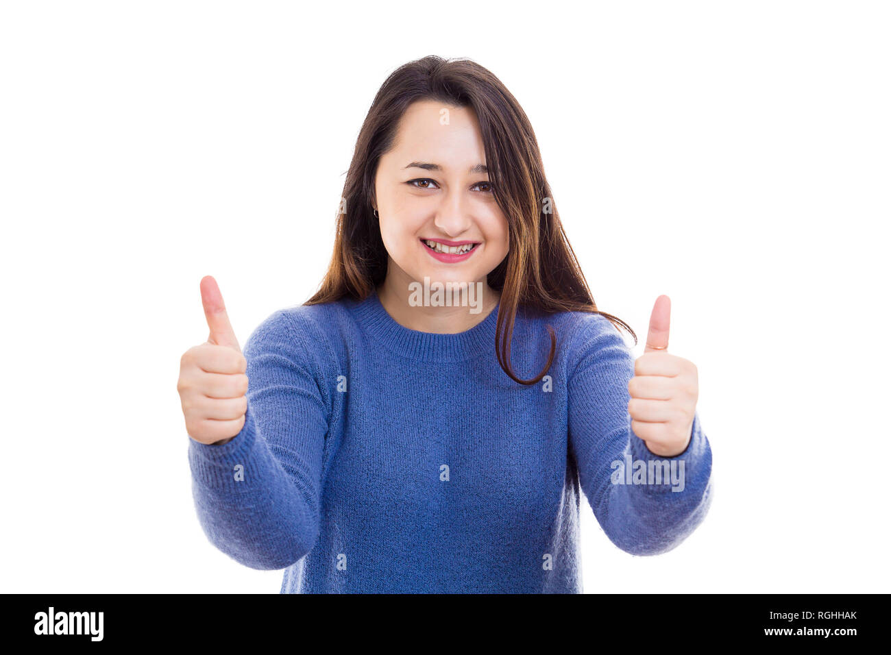 Pretty casual young woman smile to camera showing thumbs up like ...