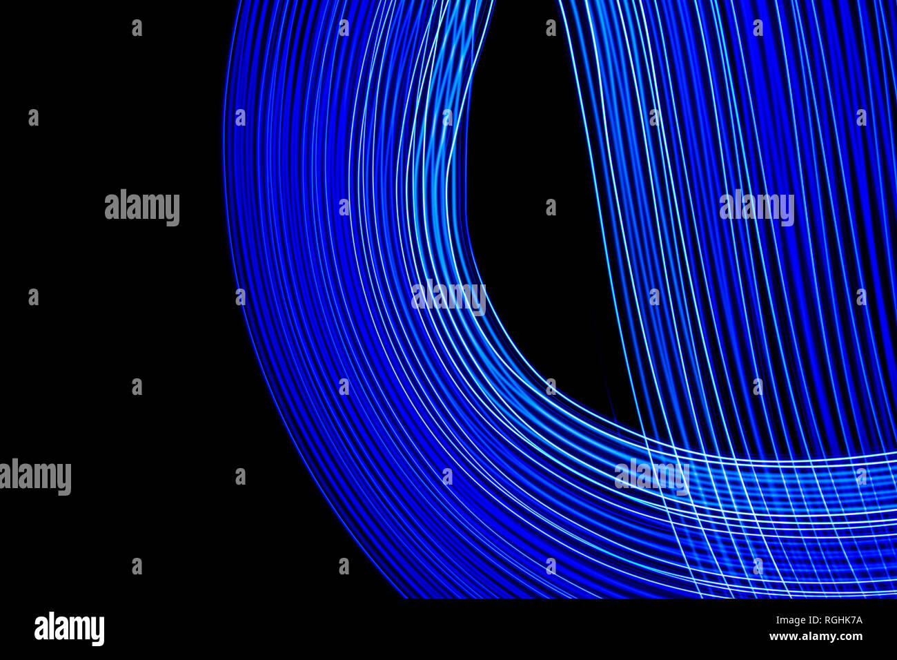 Abstract lines of blue and blue colors on black background Stock Photo ...