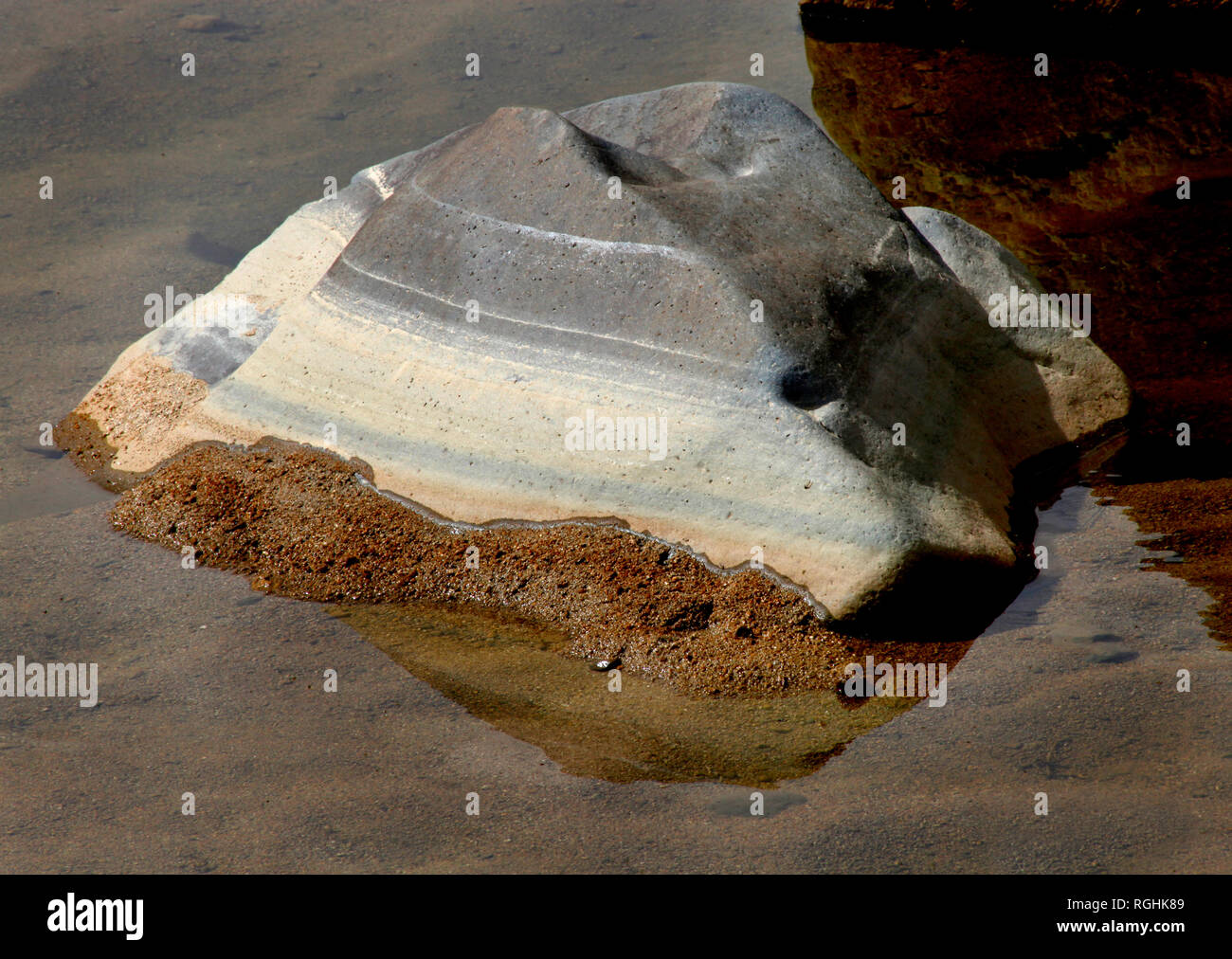 worn sea rock in the Pacific ocean in California solid rock Stock Photo ...
