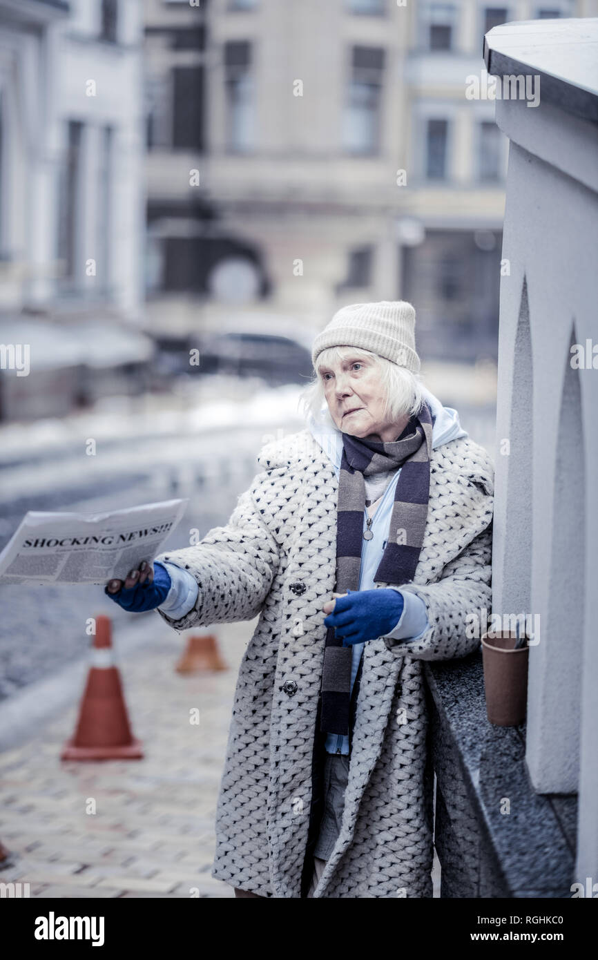 Community newspaper holding hi-res stock photography and images - Alamy