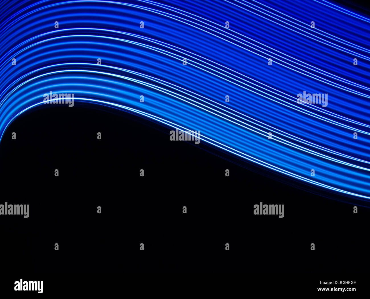 Abstract lines of blue and blue colors on black background Stock Photo ...