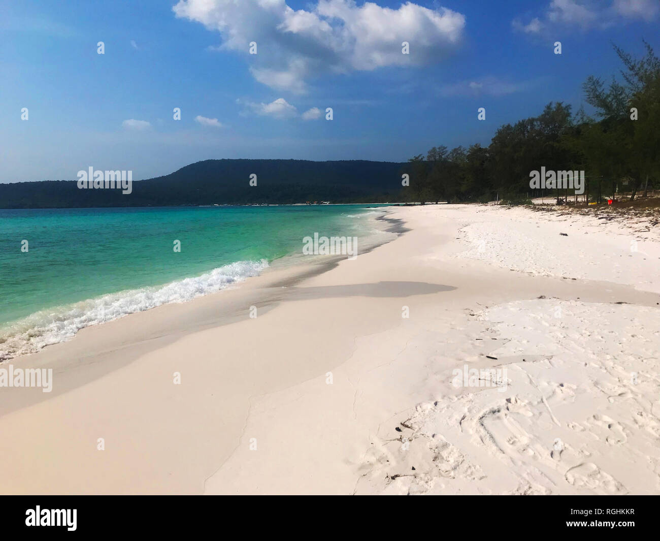 Beautiful ocean blue lagoon and palm trees of Cambodia Stock Photo - Alamy