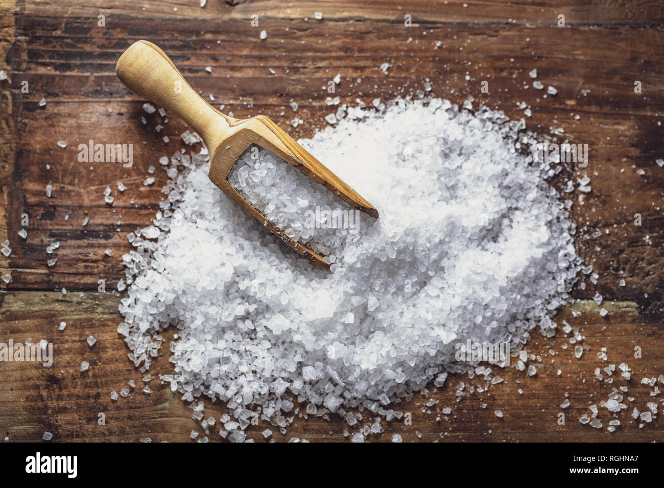 sea salt on a dark beautiful wooden background Stock Photo - Alamy