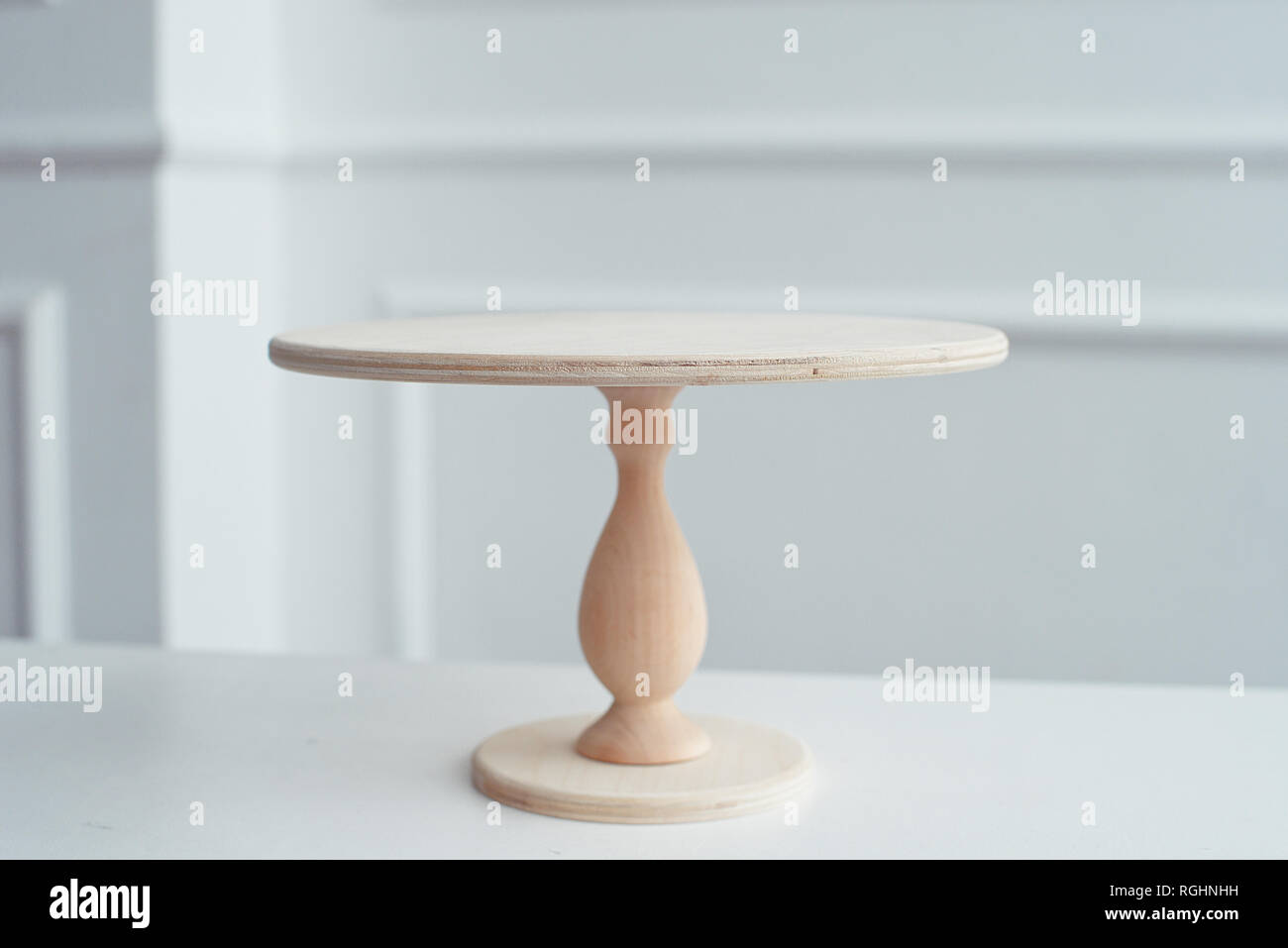Empty wooden stand for cake isolated on white background Stock Photo ...
