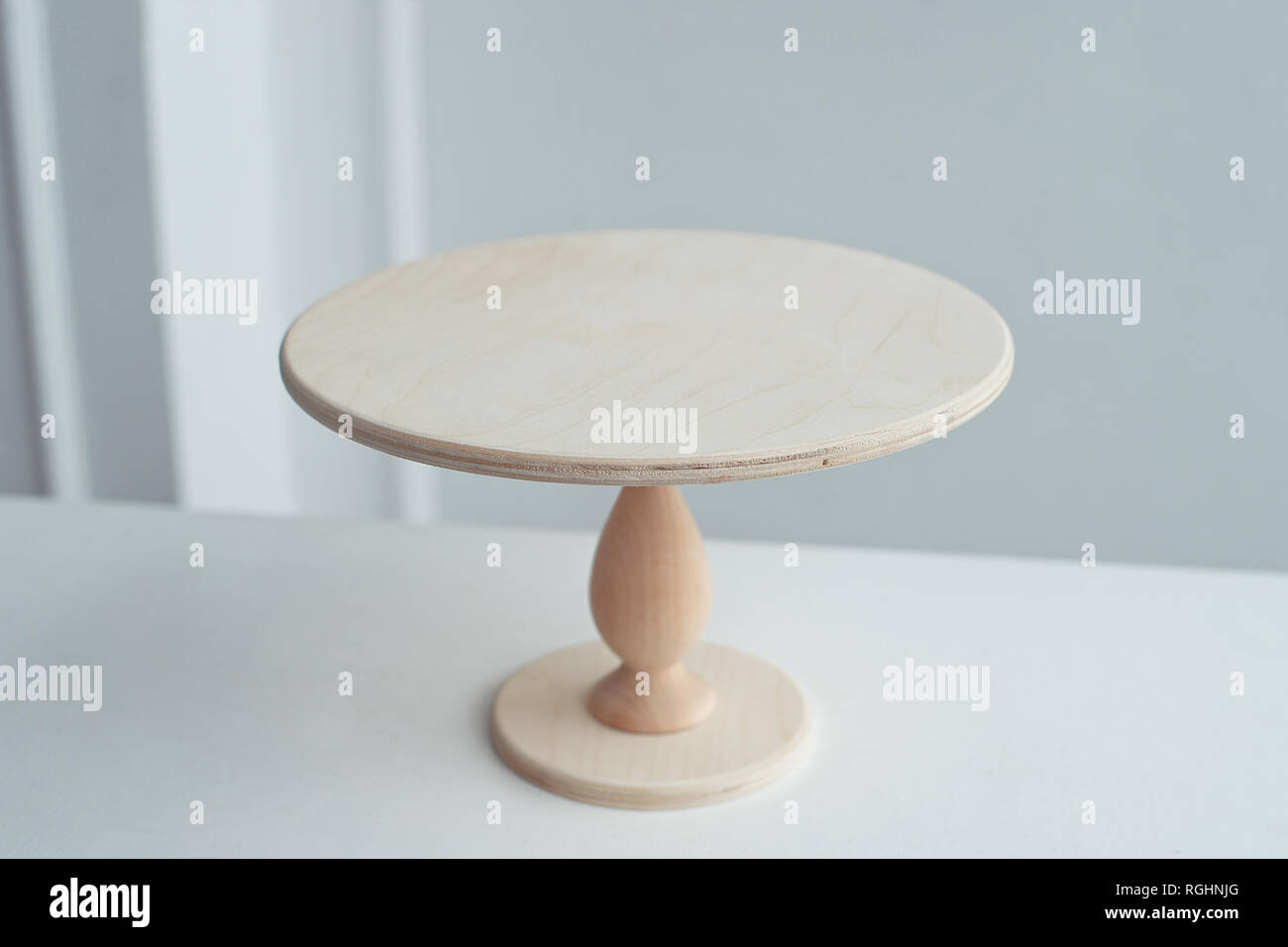 Empty wooden stand for cake isolated on white background Stock Photo ...