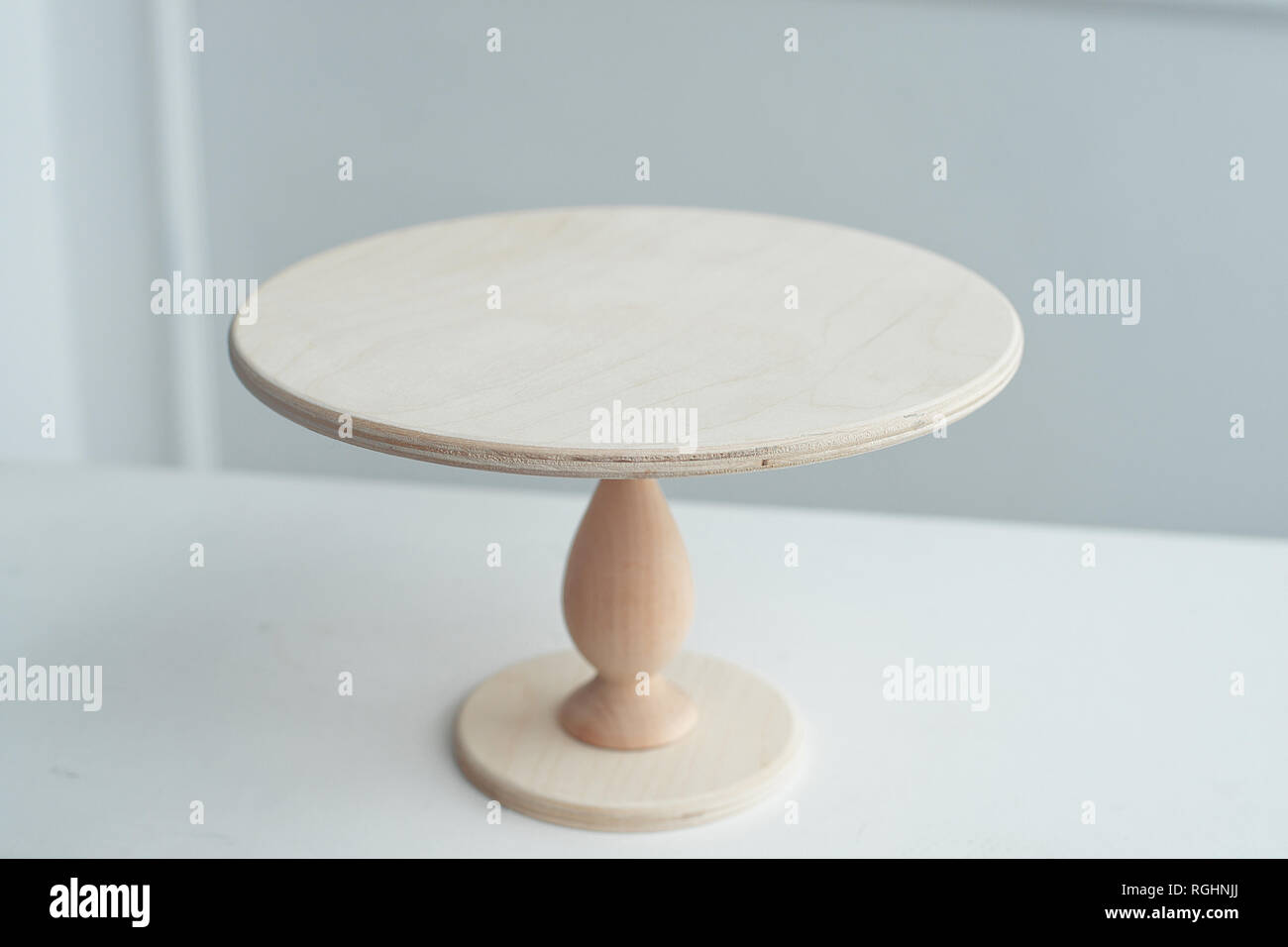 Empty wooden stand for cake isolated on white background Stock Photo ...