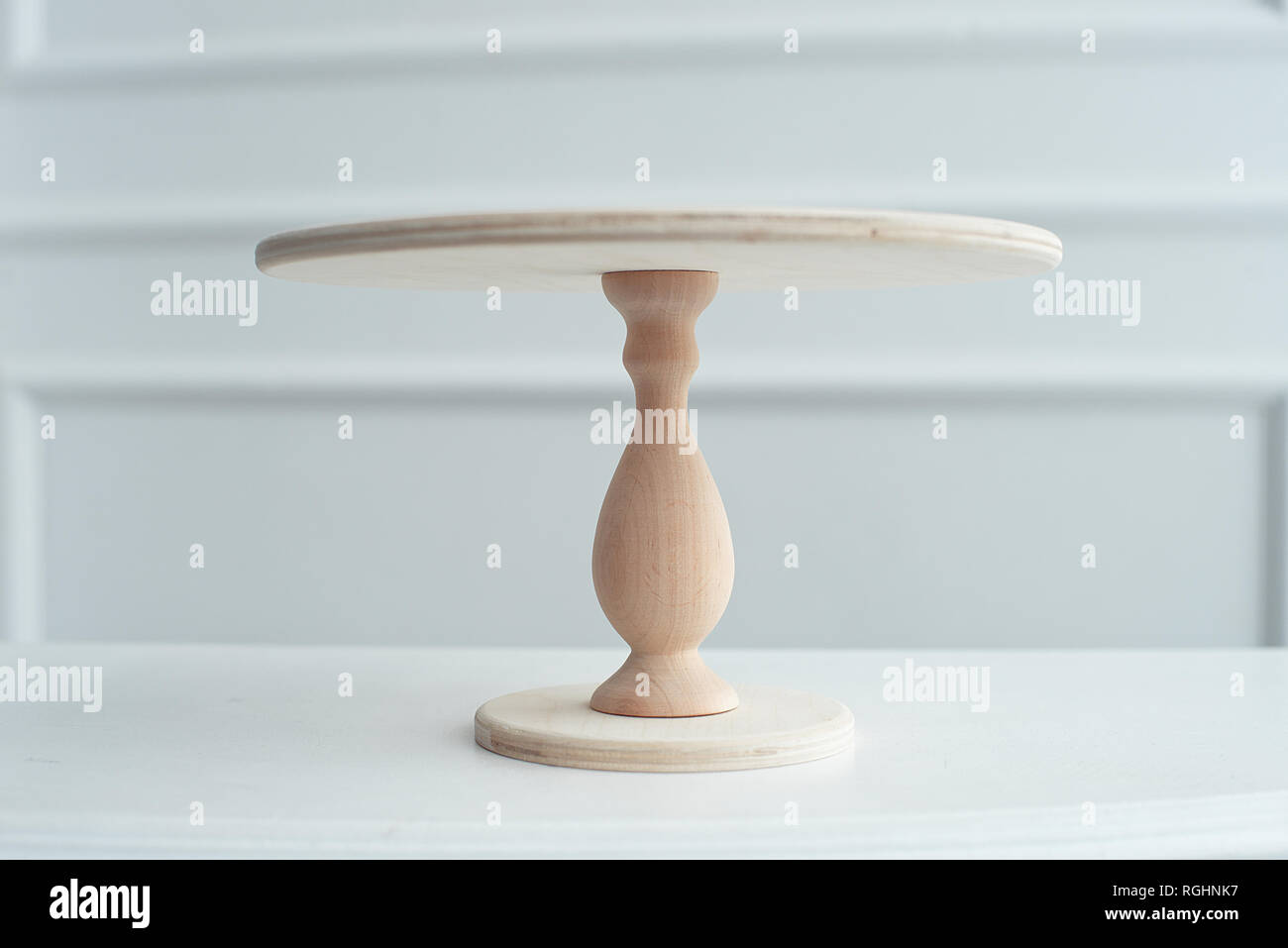Empty wooden stand for cake isolated on white background Stock Photo ...
