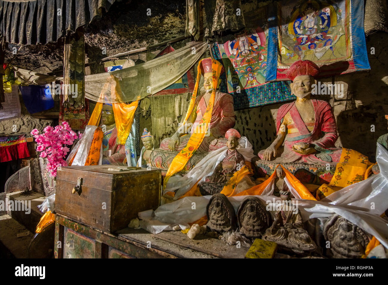 Statues and religious decorations inside Luri Gompa, an old buddhist ...