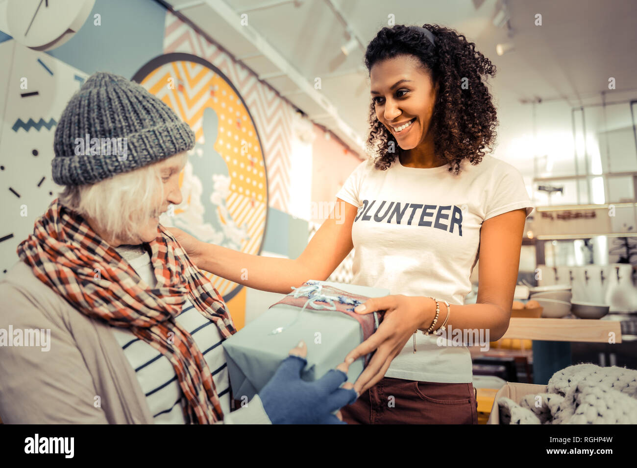 Woman giving nice present hi-res stock photography and images - Alamy