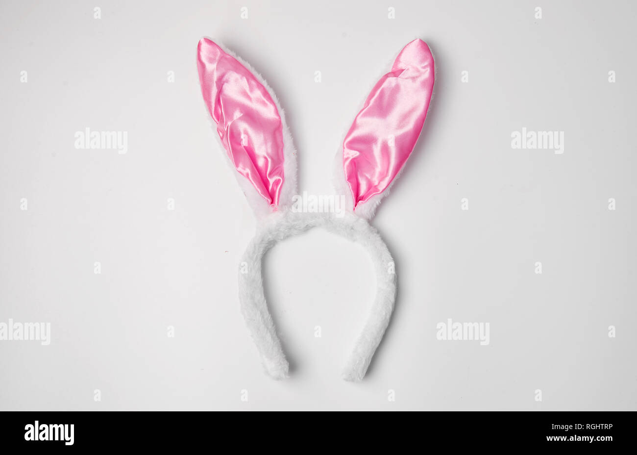 Top view of grey rabbit ears on white background easter minimal blogger ...