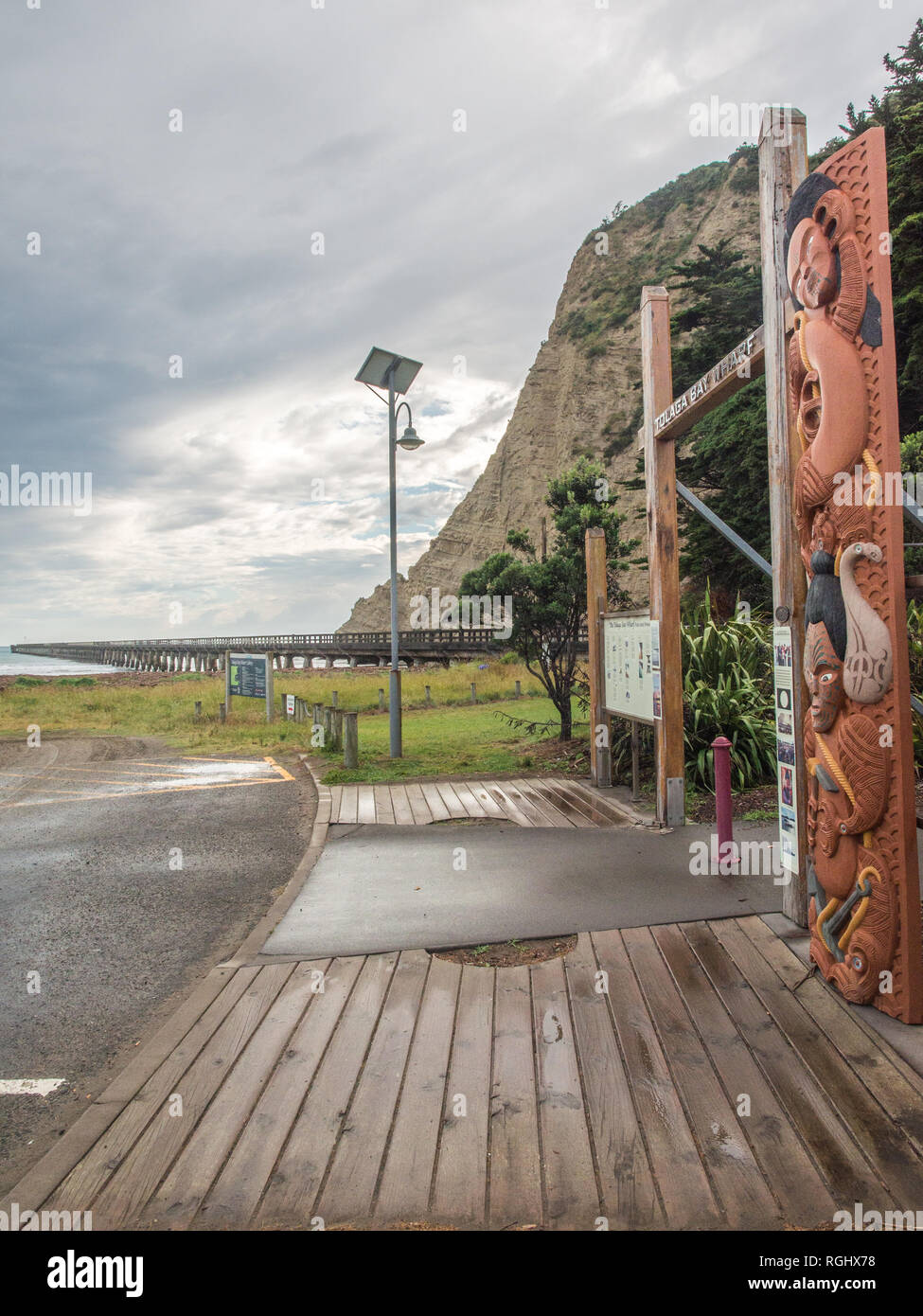 Carved gateway to Tologa Bay Wharf, East Cape, North Island, New ...