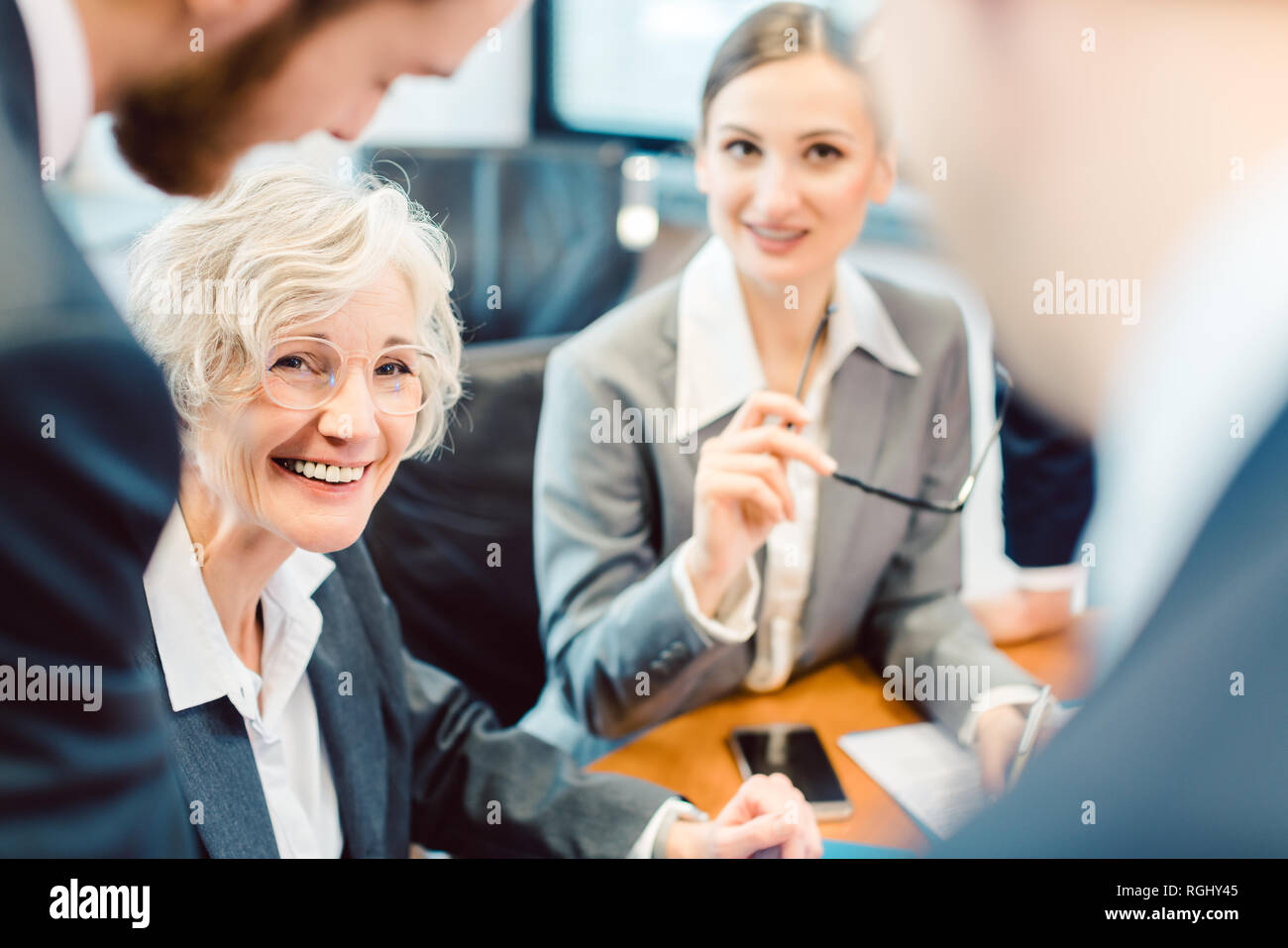 Business people during negotiation of an agreement Stock Photo - Alamy