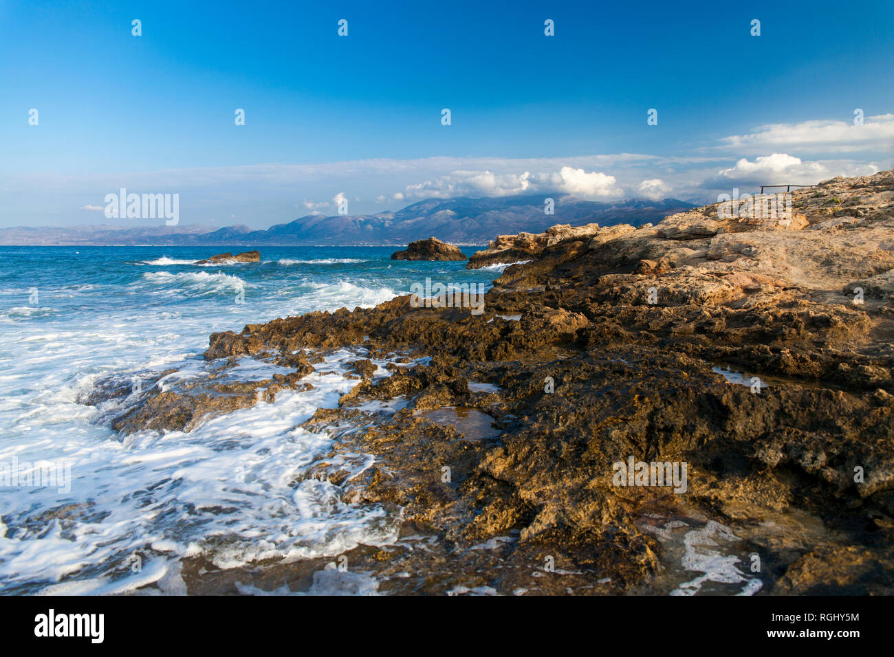 The rocks are in contact with the sea. Rocky beach, sharp rocks ...