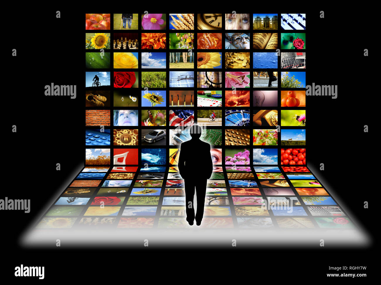 man standing in front of flat panels screens with images Stock Photo ...