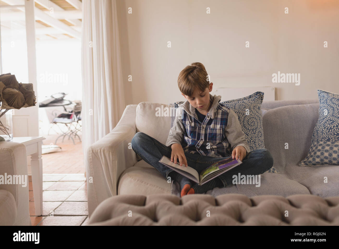 Boy reading a story hi-res stock photography and images - Alamy