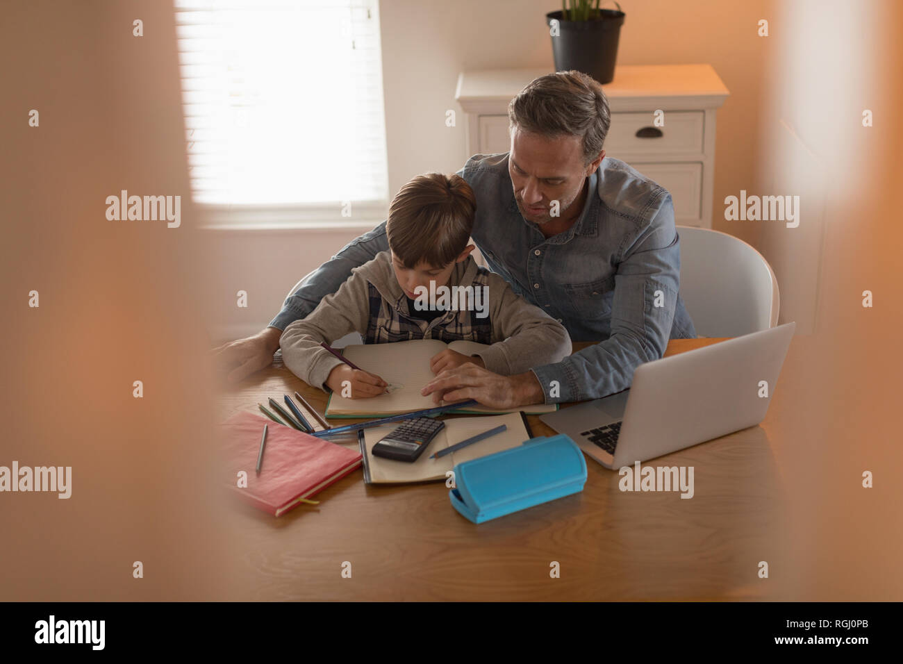 Father teaching son math hi-res stock photography and images - Alamy