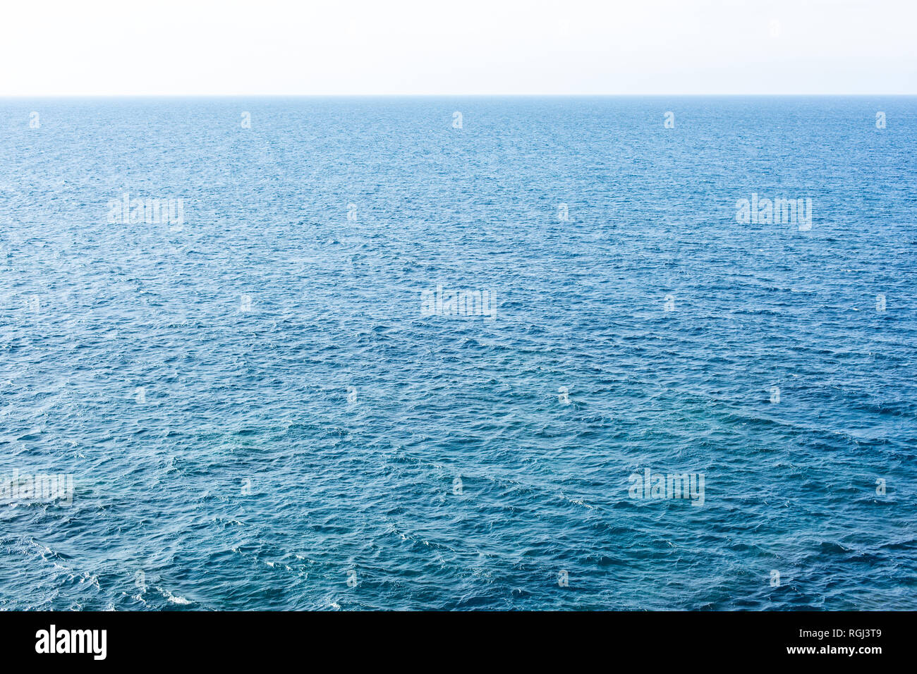 Blue and bright water surface of the Atlantic Ocean. Cool background Stock Photo - Alamy