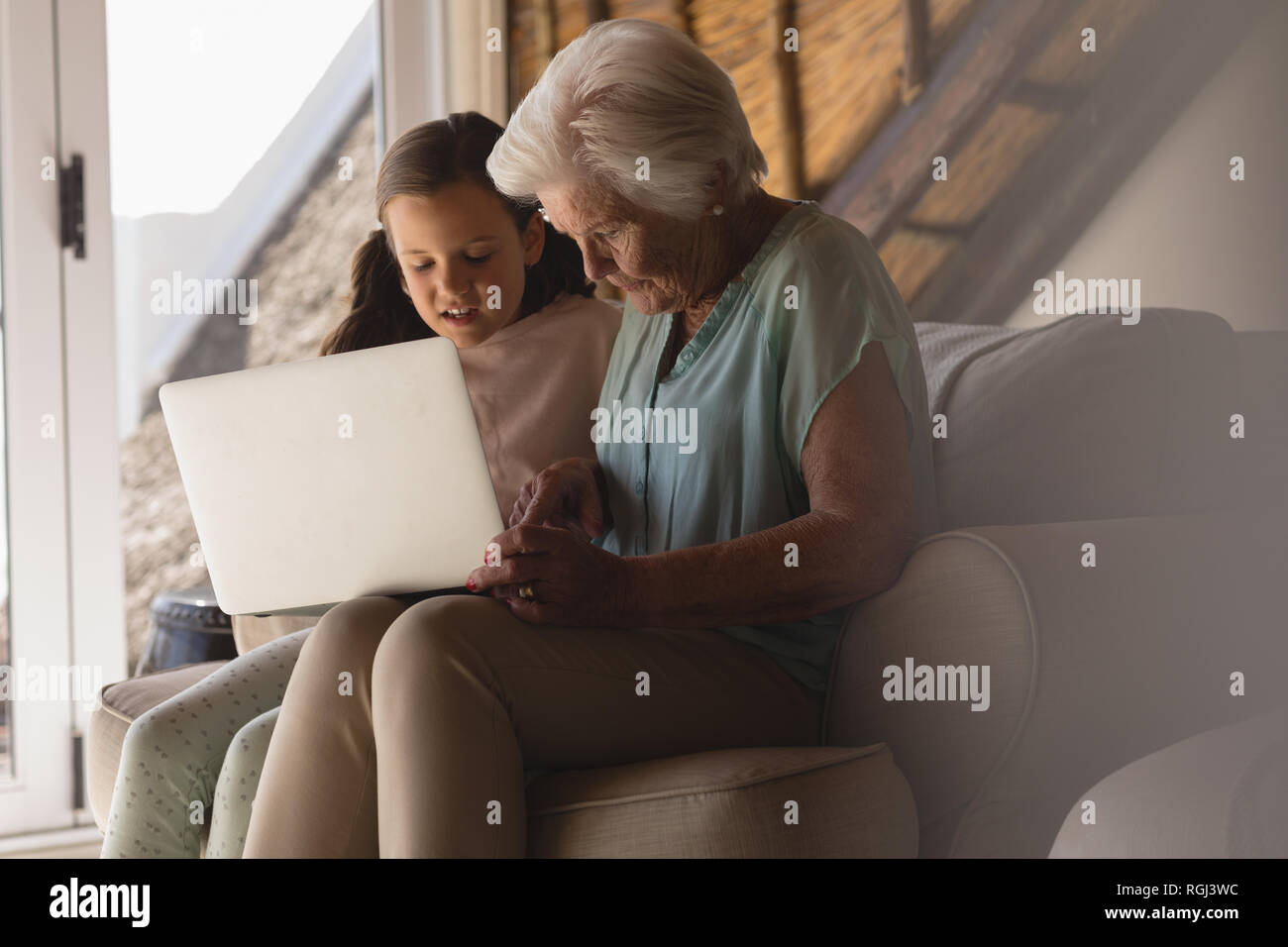 Elderly caucasian grandmother woman using hi-res stock photography and ...