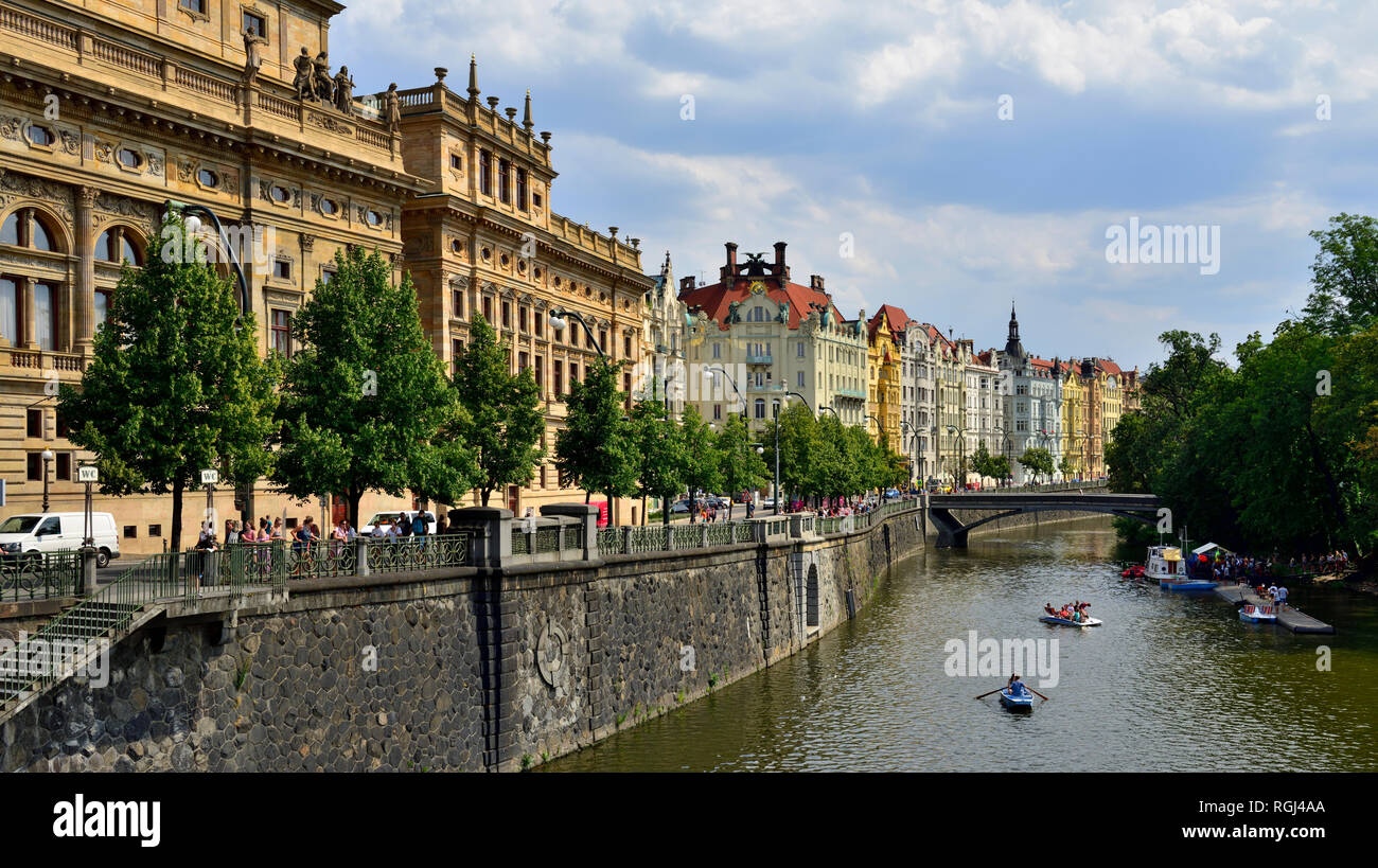 Prague view down the River Vltava along riverbank in old town with ...