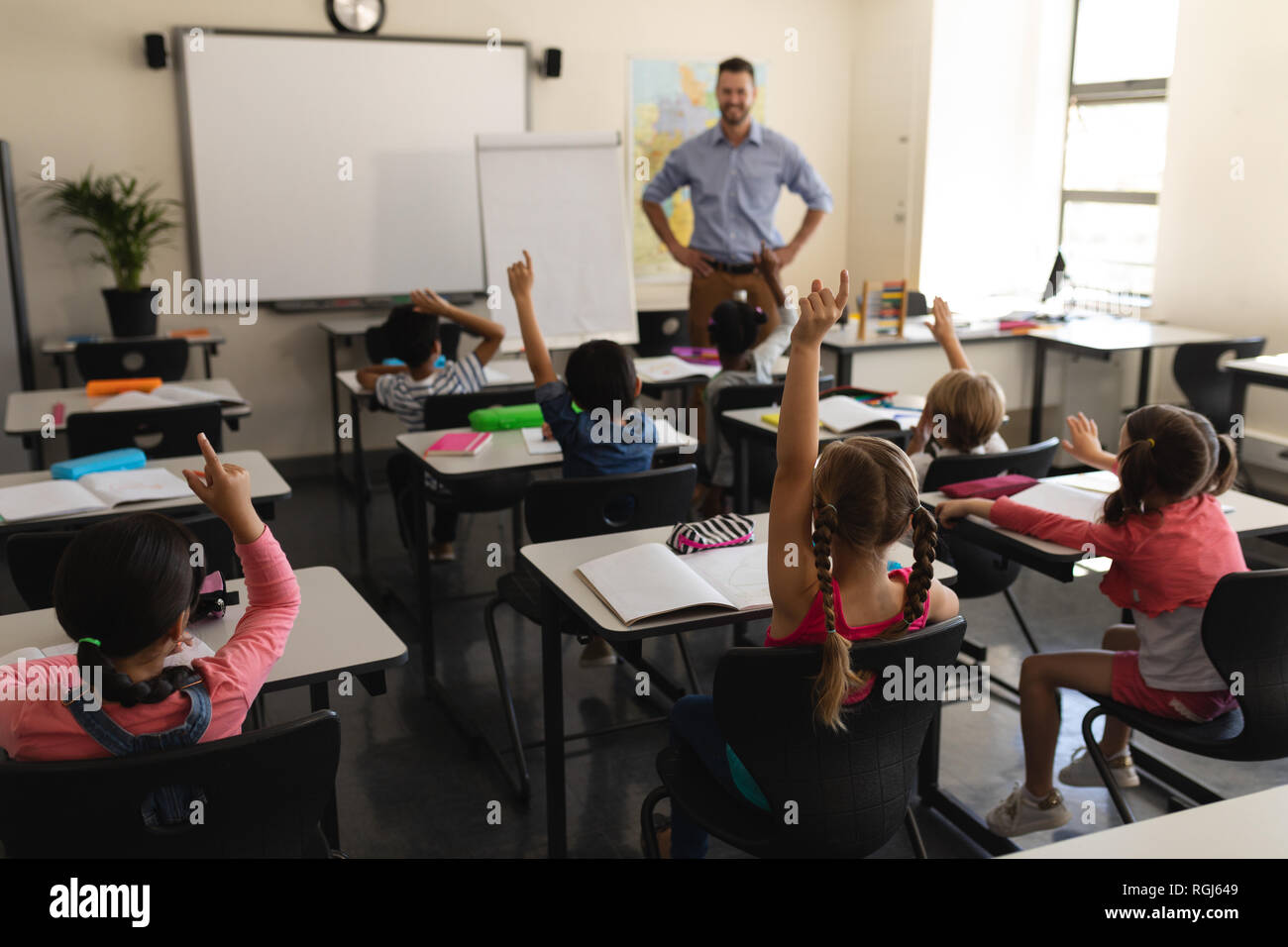 Middle School Kids Raising Hands