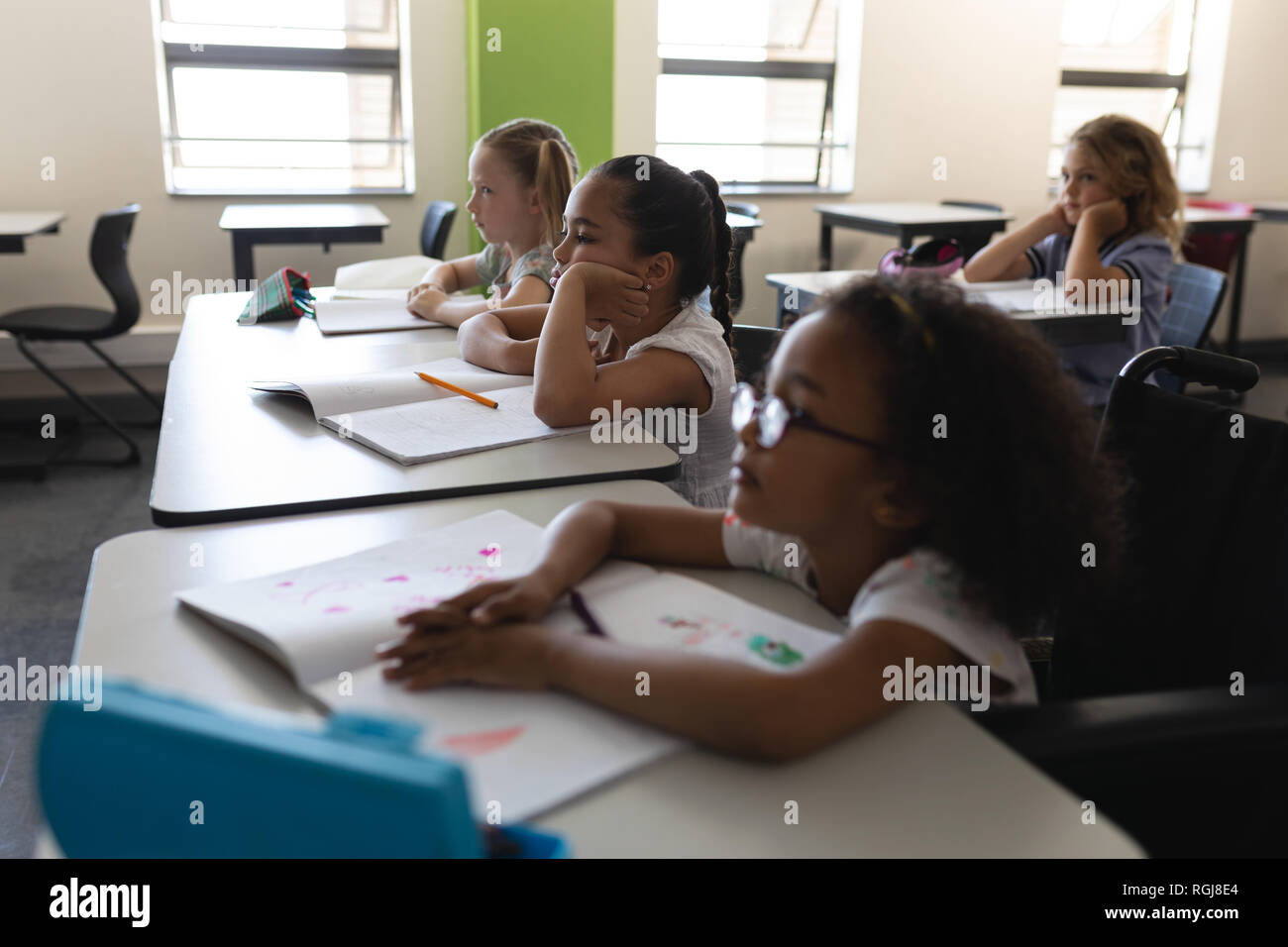 Side view school girl studying hi-res stock photography and images - Alamy