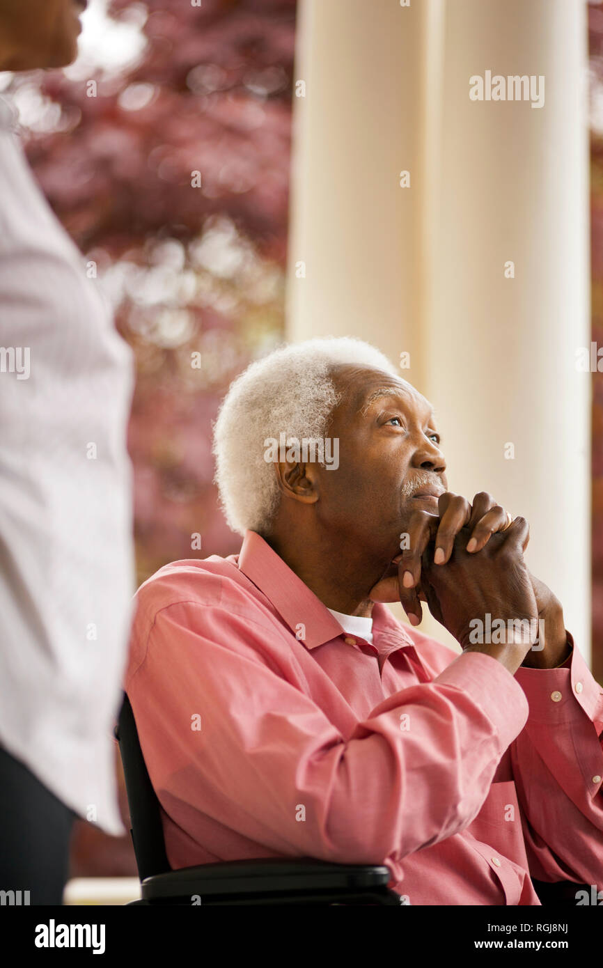 Senior man looking hopeful Stock Photo - Alamy
