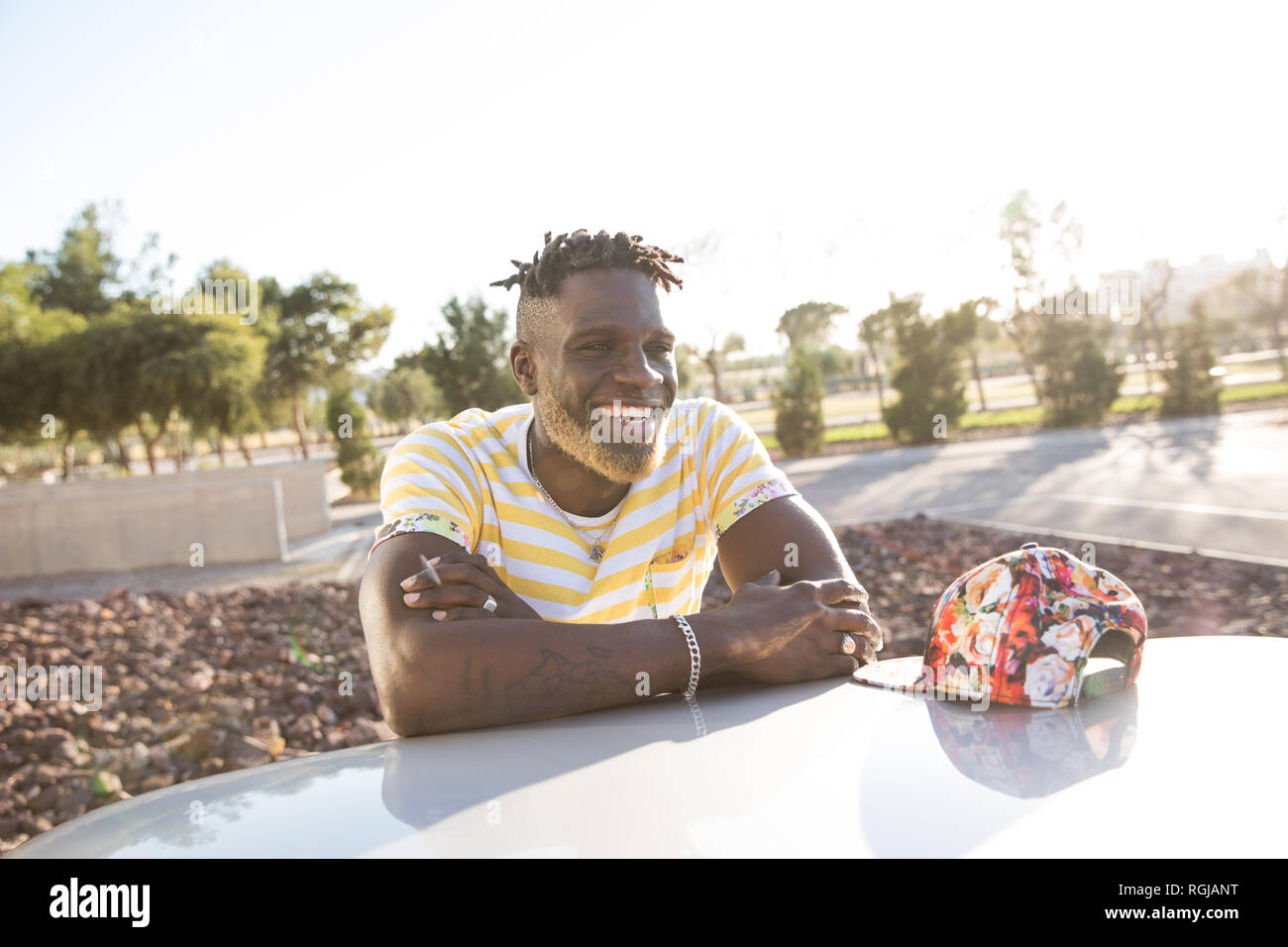 Handsome black man smiling Stock Photo - Alamy