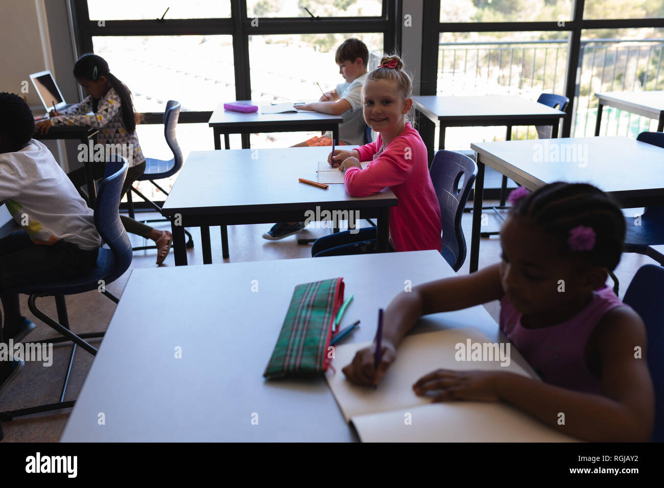 Kid working classroom hi-res stock photography and images - Alamy