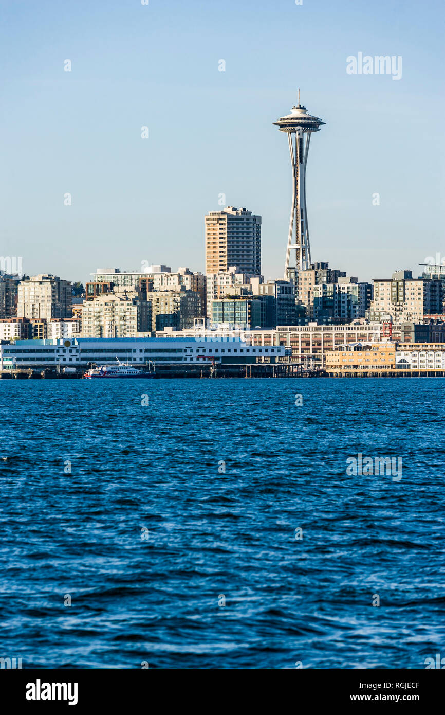 The Space Needle and surrounding buildings on the waterfront of ...