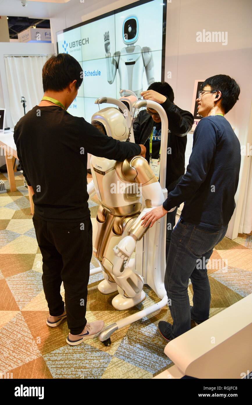 Ubtech's humanoid robot, Walker, demonstrates robotic skills at exhibit ...