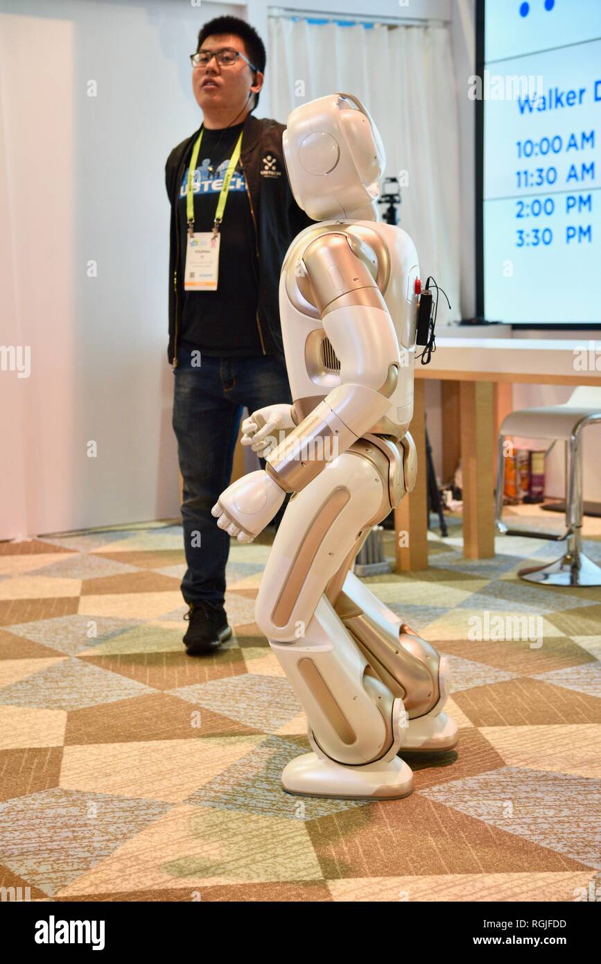 Ubtech's humanoid robot, Walker, demonstrates robotic skills at exhibit ...