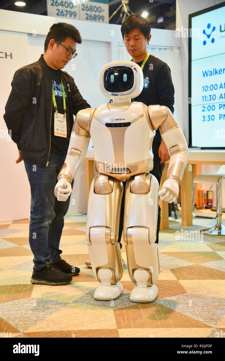 Ubtech's humanoid robot, Walker, demonstrates robotic skills at exhibit ...
