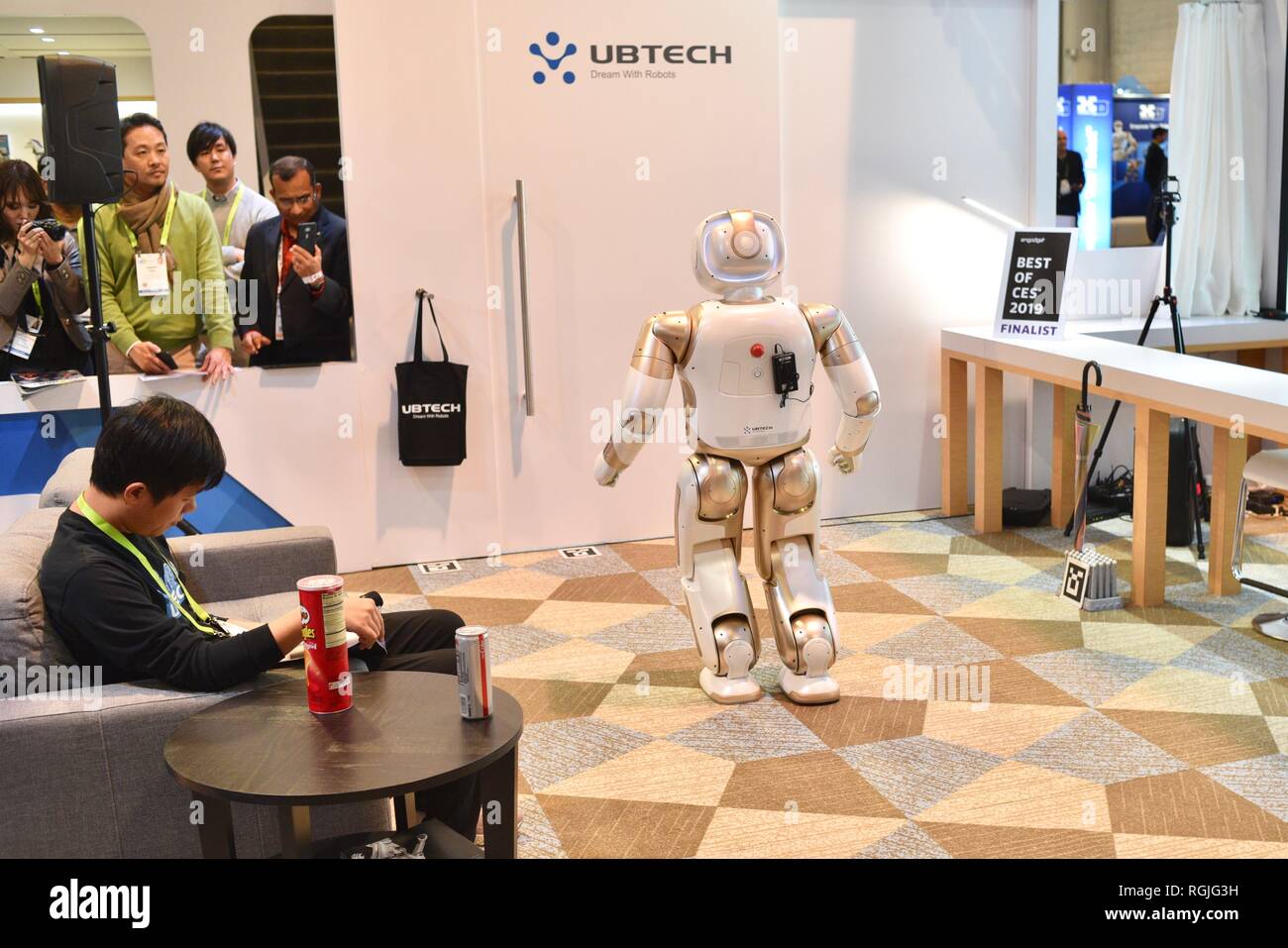 Ubtech's humanoid robot, Walker, demonstrates robotic skills at exhibit ...