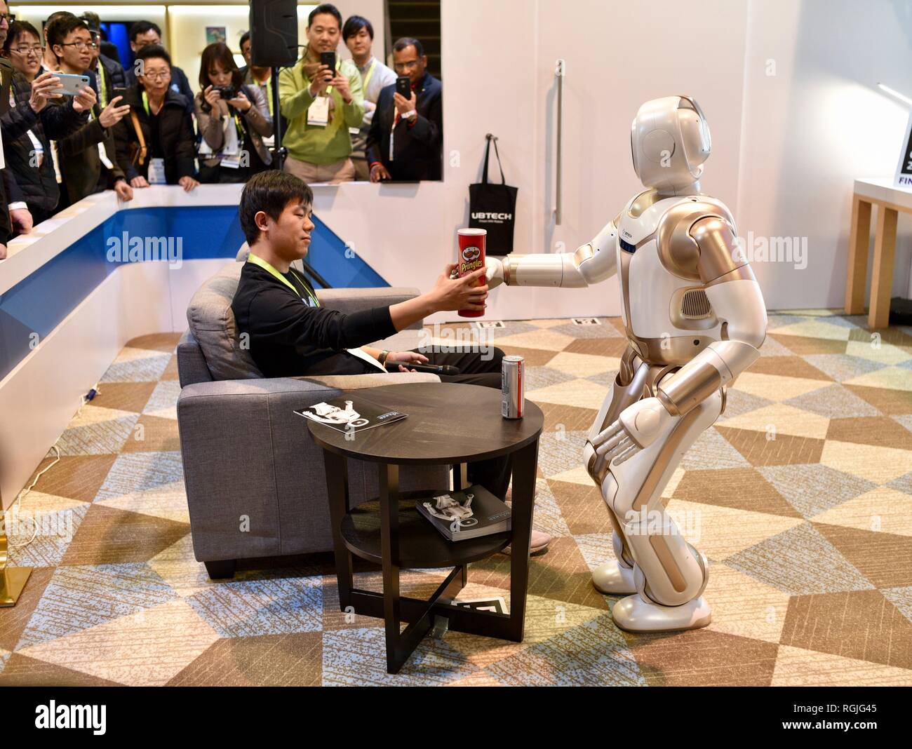 Ubtech's humanoid robot, Walker, demonstrates robotic skills at exhibit ...