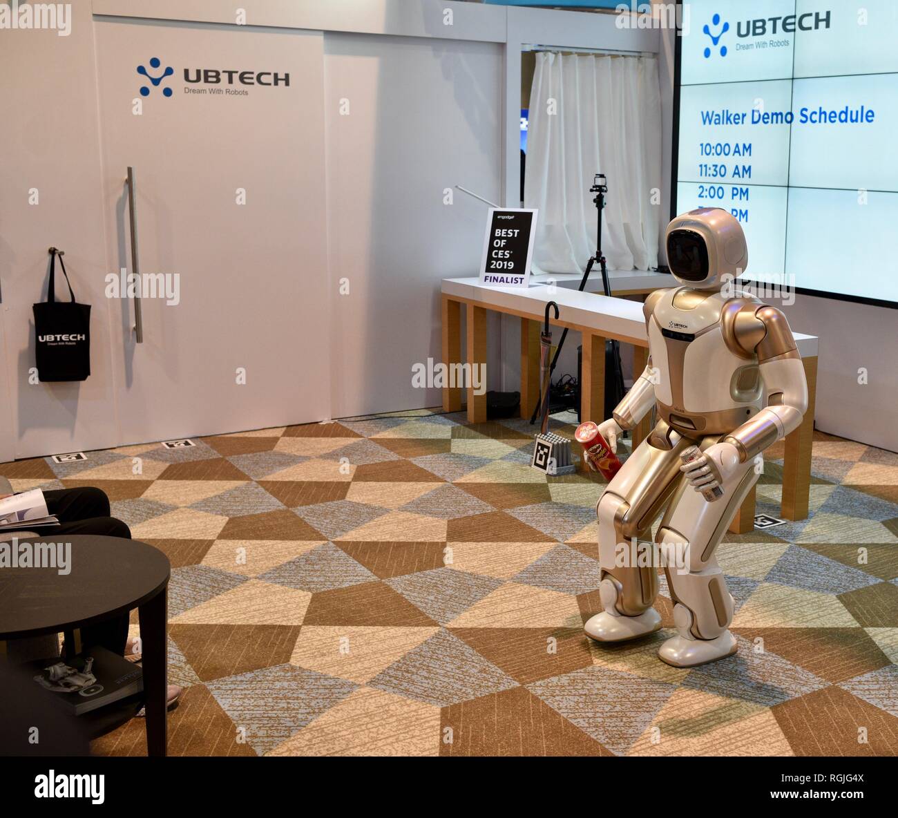Ubtech's humanoid robot, Walker, demonstrates robotic skills at exhibit ...