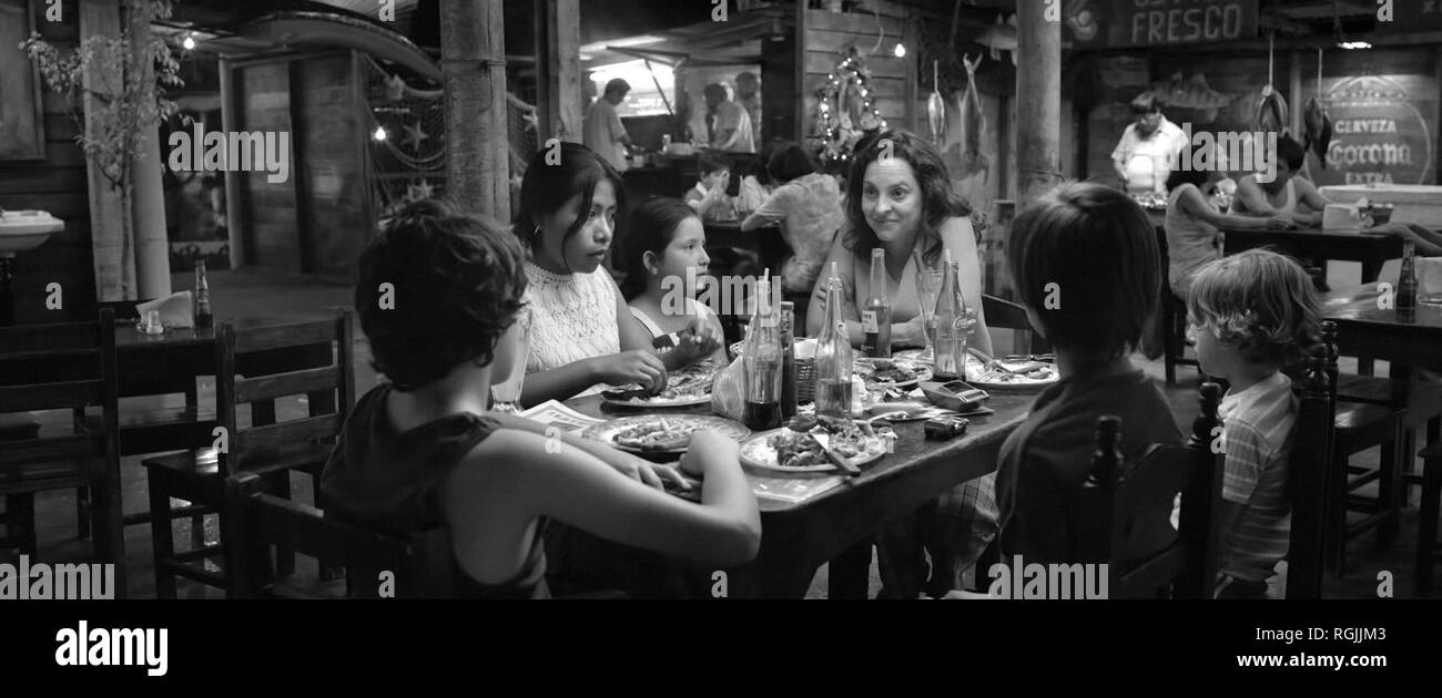 ROMA, from left: Diego Cortina Autrey (back to camera), Yalitza ...