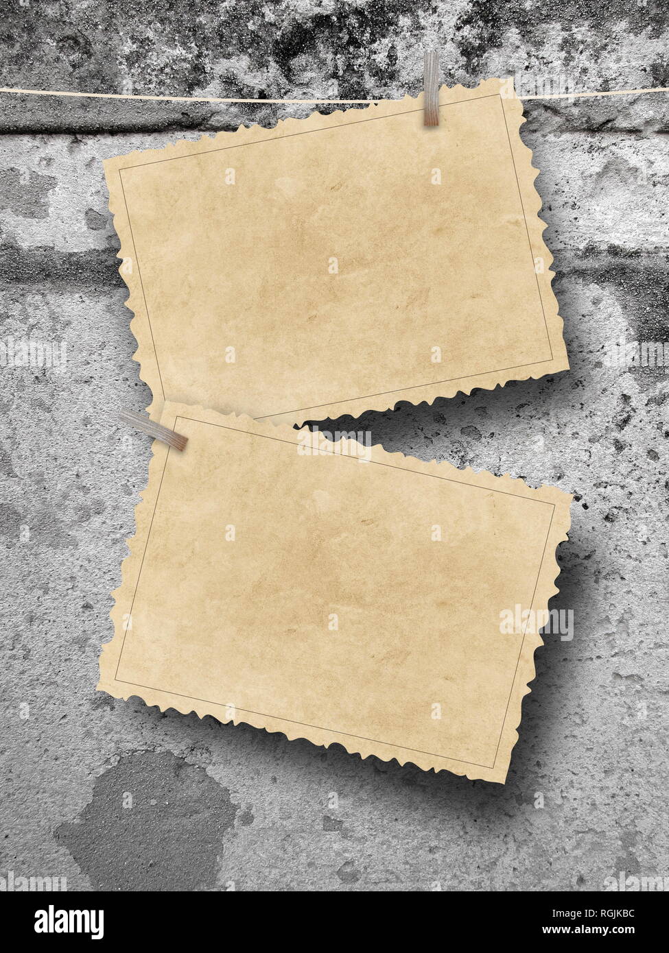 Two blank old vintage postcard frames against gray concrete wall ...