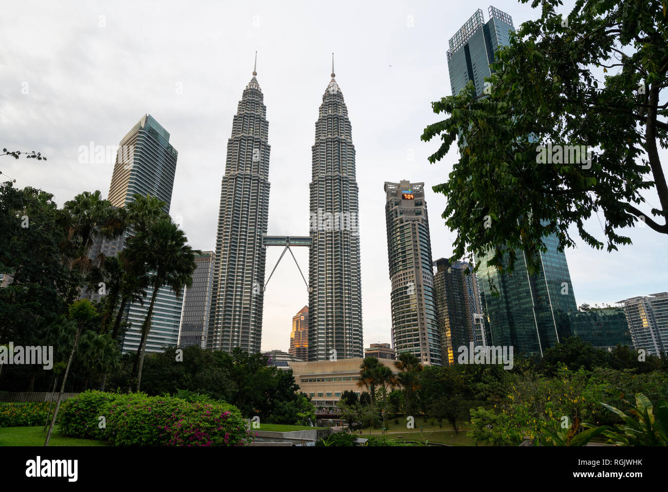 The KLCC park with The Petronas twin towers in the background Stock ...