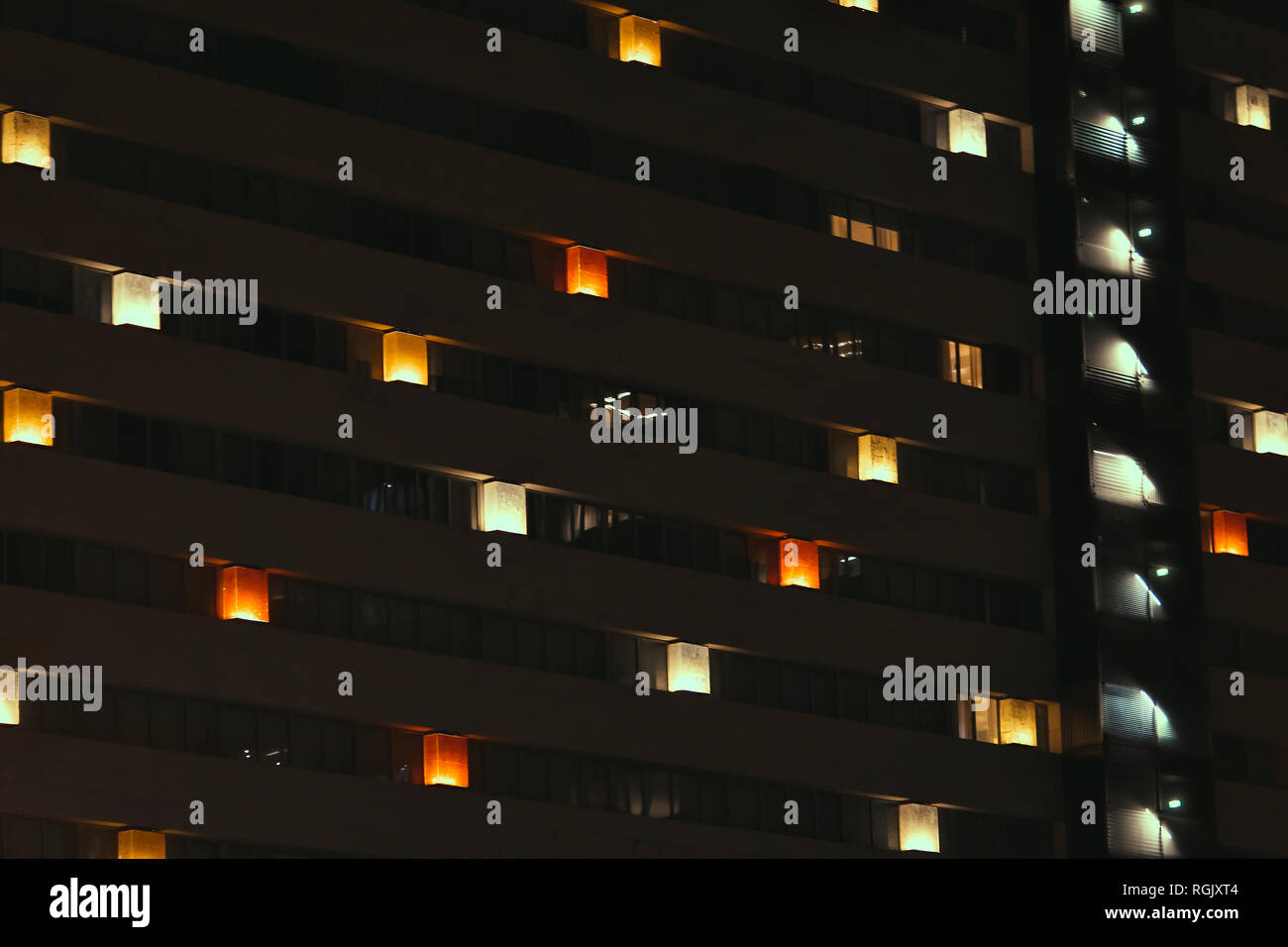 Frontal view of the night facade of building with a many windows Stock ...