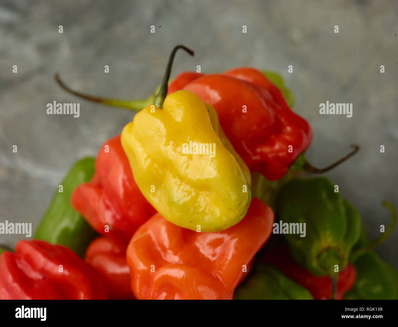 Scotch Bonnet peppers food still-life photograph Stock Photo - Alamy