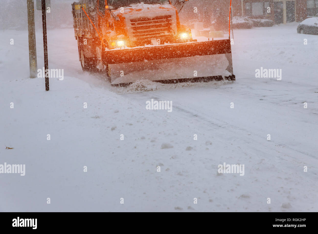 Tractor clearing snow the way after heavy after snowfall Stock Photo ...