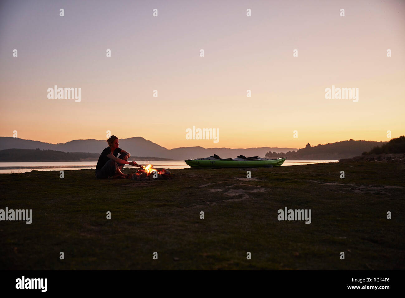 Sitting beside fire hi-res stock photography and images - Alamy