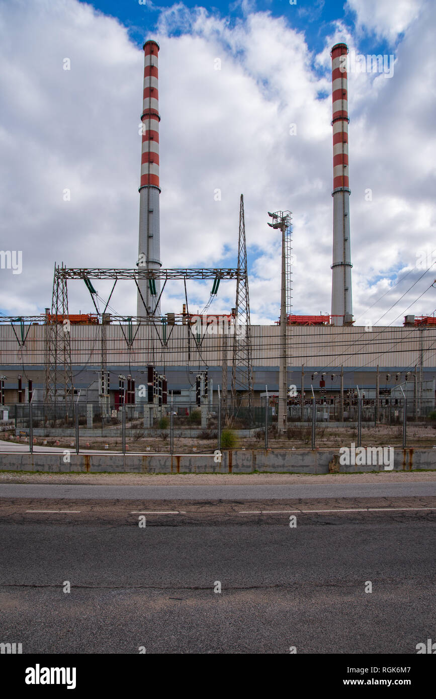 Energy factory electricity powerlines Stock Photo - Alamy
