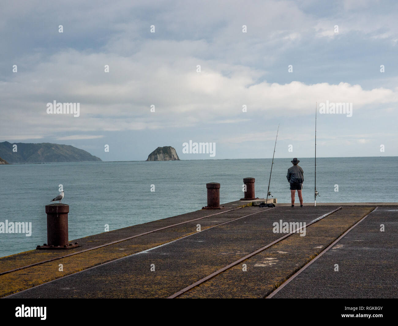Fishing from tologa bay wharf hi-res stock photography and images - Alamy