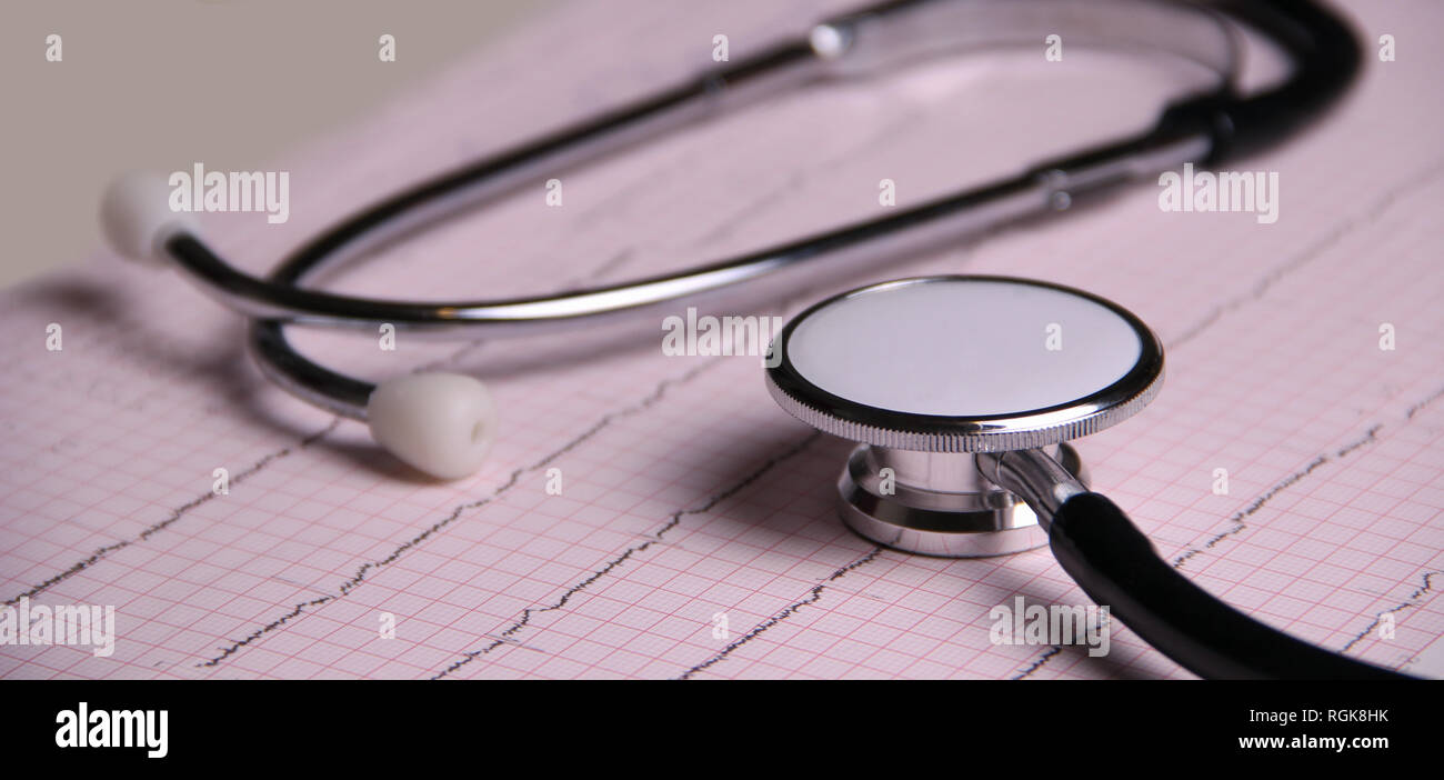 Electrocardiogram results and stethoscope Stock Photo - Alamy