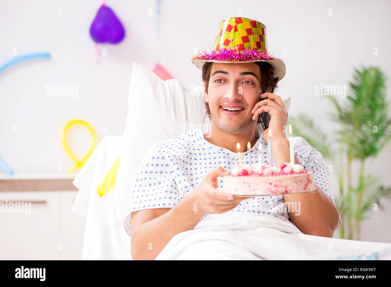 Young man celebrating his birthday in hospital Stock Photo - Alamy